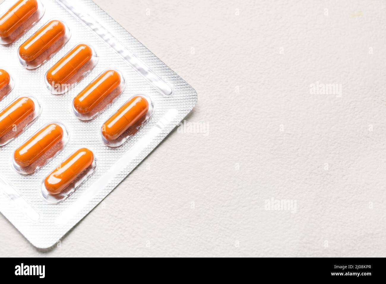 Blister pack with turmeric powder capsules on white background Stock ...