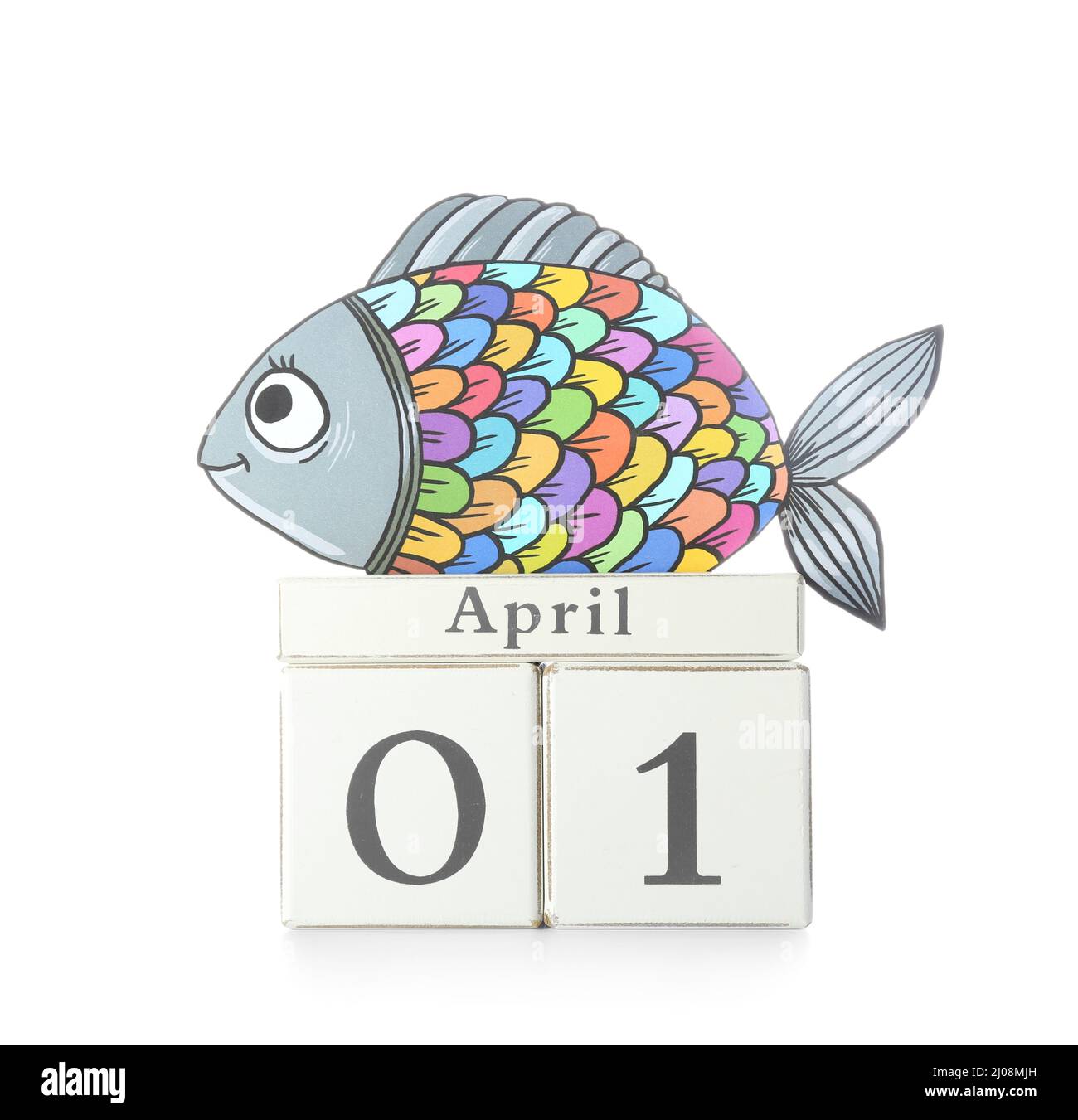 Cube calendar and paper fish on white background. April Fools Day ...