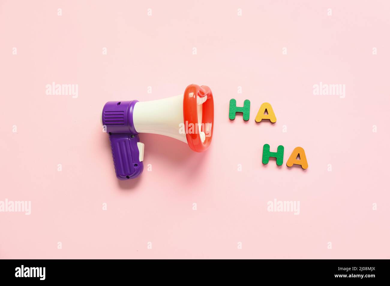 Composition with megaphone and text HA HA for April Fools Day ...