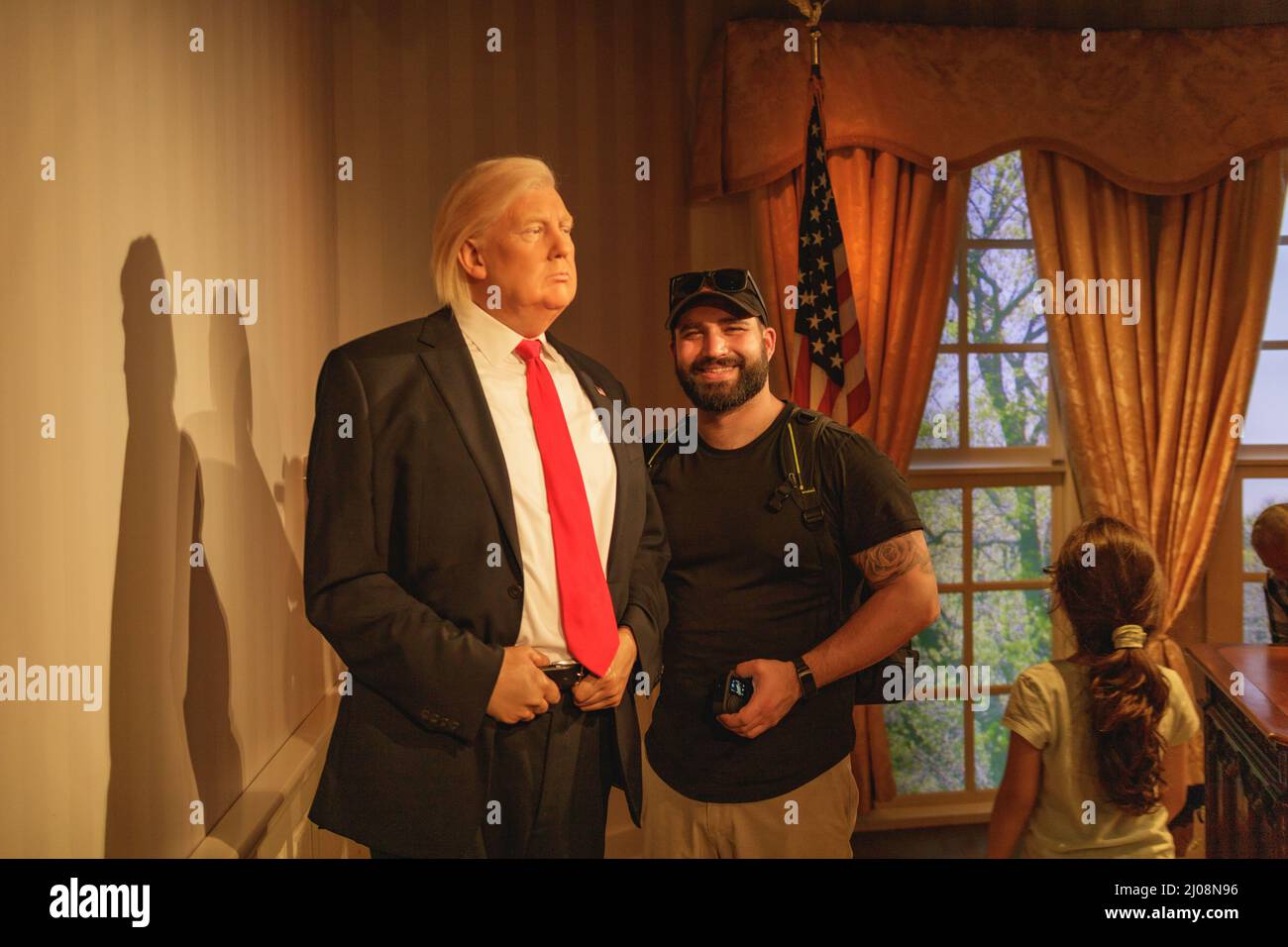 Tourist guy posing with Donal Trump wax figure in Madame Tussauds ...