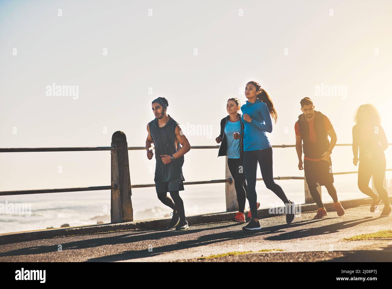 Working hard to conquer that inner couch potato. Shot of a fitness ...