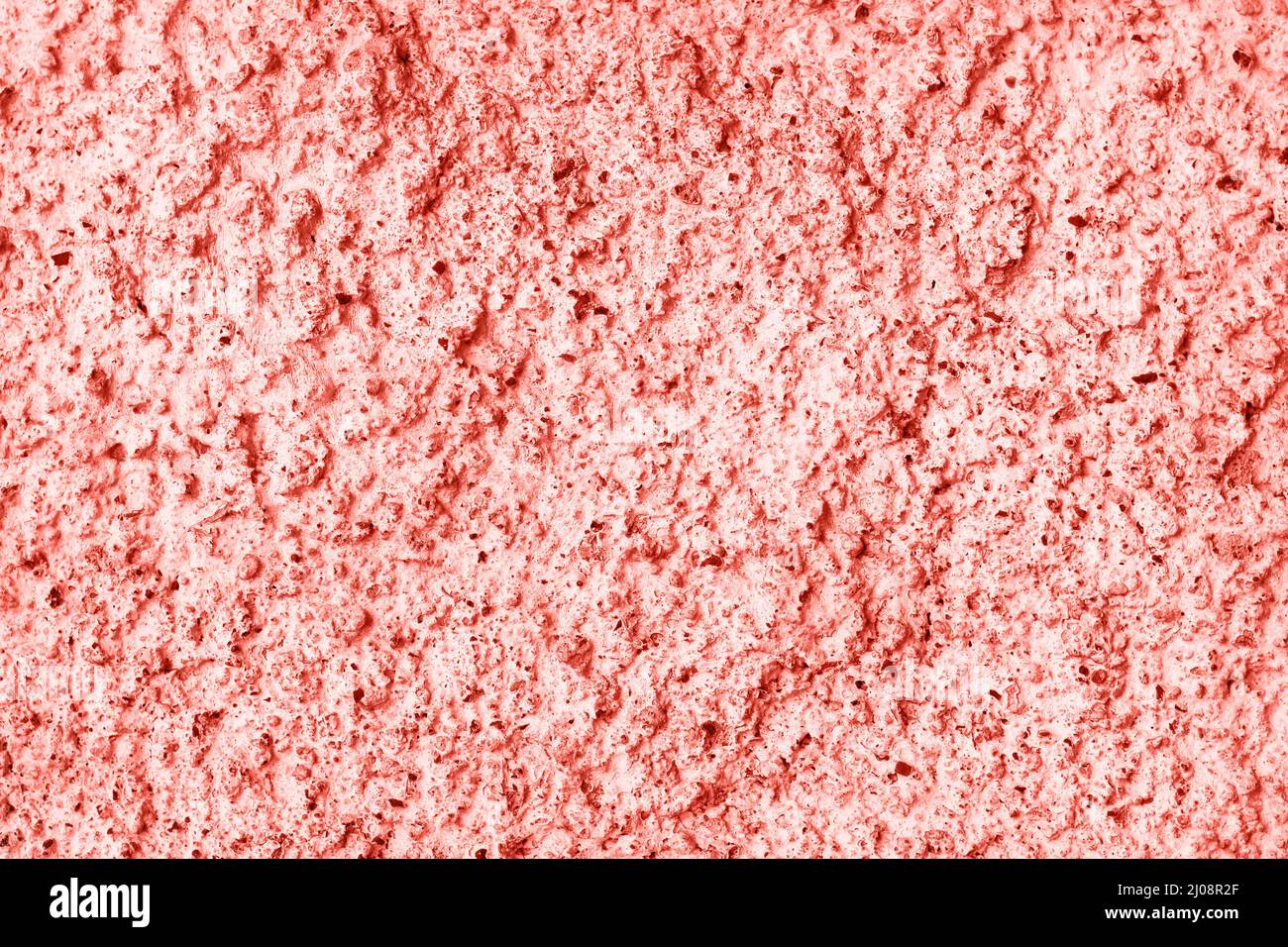 Coral decorative plaster texture on the wall Stock Photo - Alamy