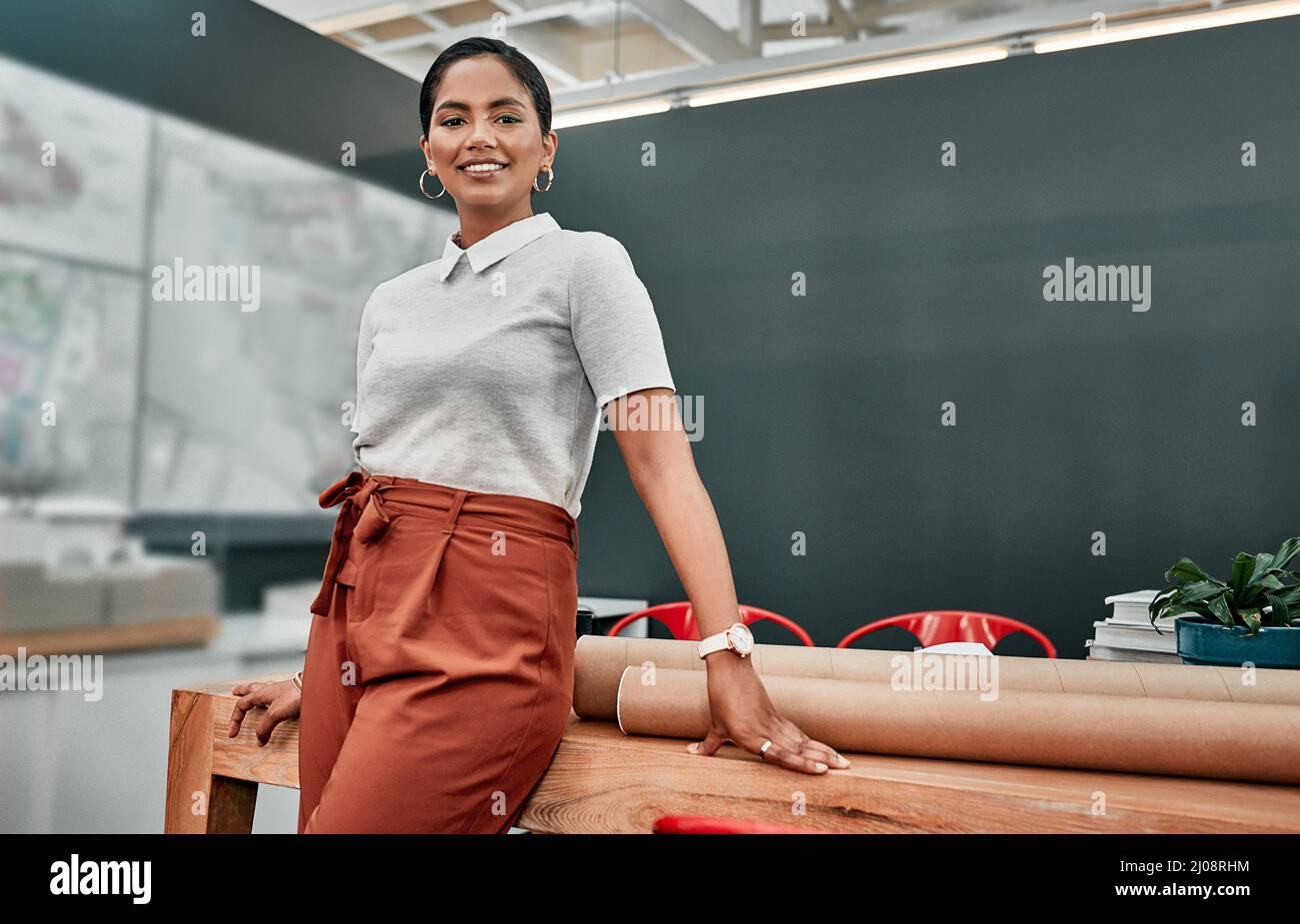 Shes got that go-getter mindset. Portrait of a young architect standing ...