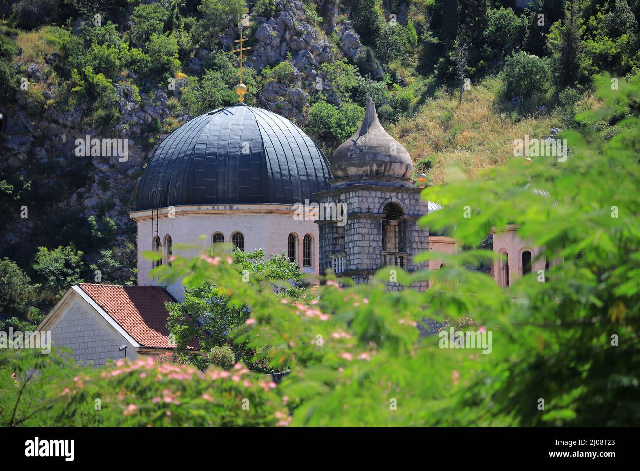 The dome of the monastery in the mountains in Kotor city Stock Photo ...