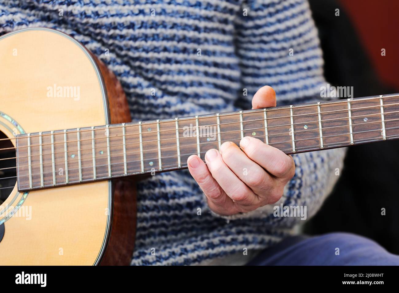 Guitar Player Hand or Musician's Hand in F Major Chord on Acoustic ...