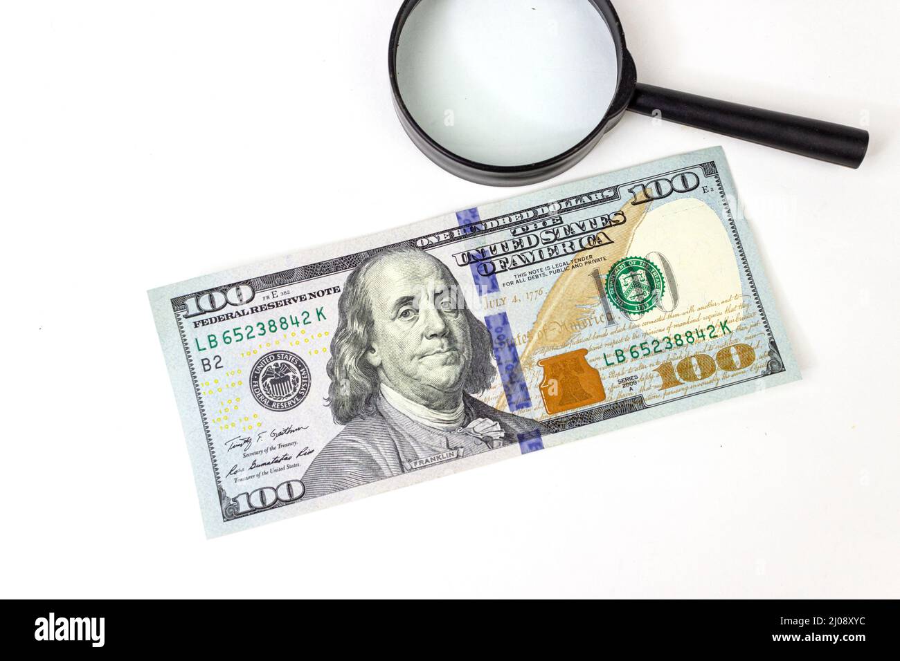 Magnifying glass on dollar banknotes. Zoom to money. Checking ...