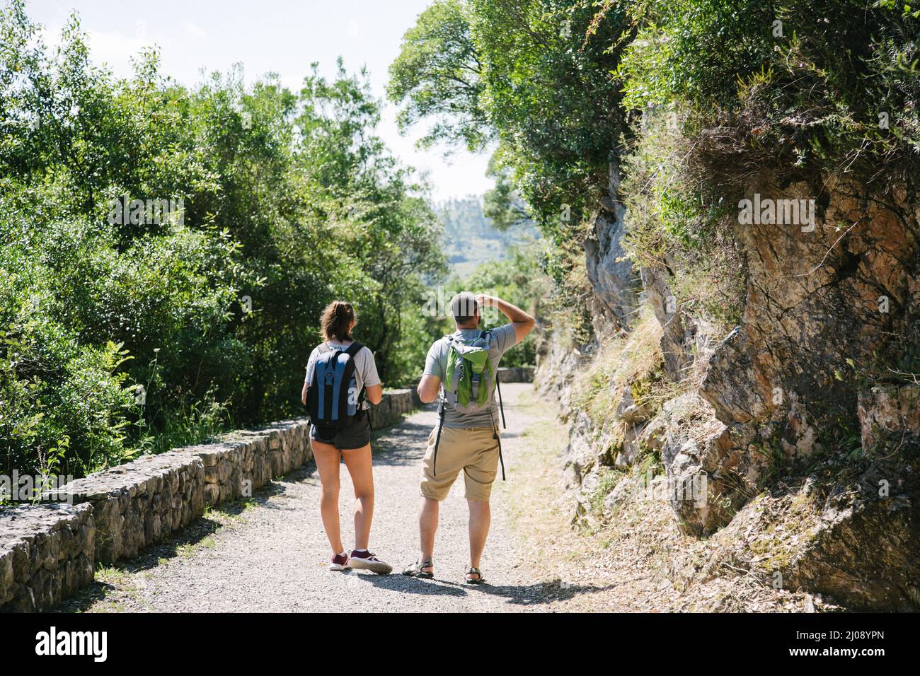 Travelers father daughter walking climbing on mountain summit Stock ...