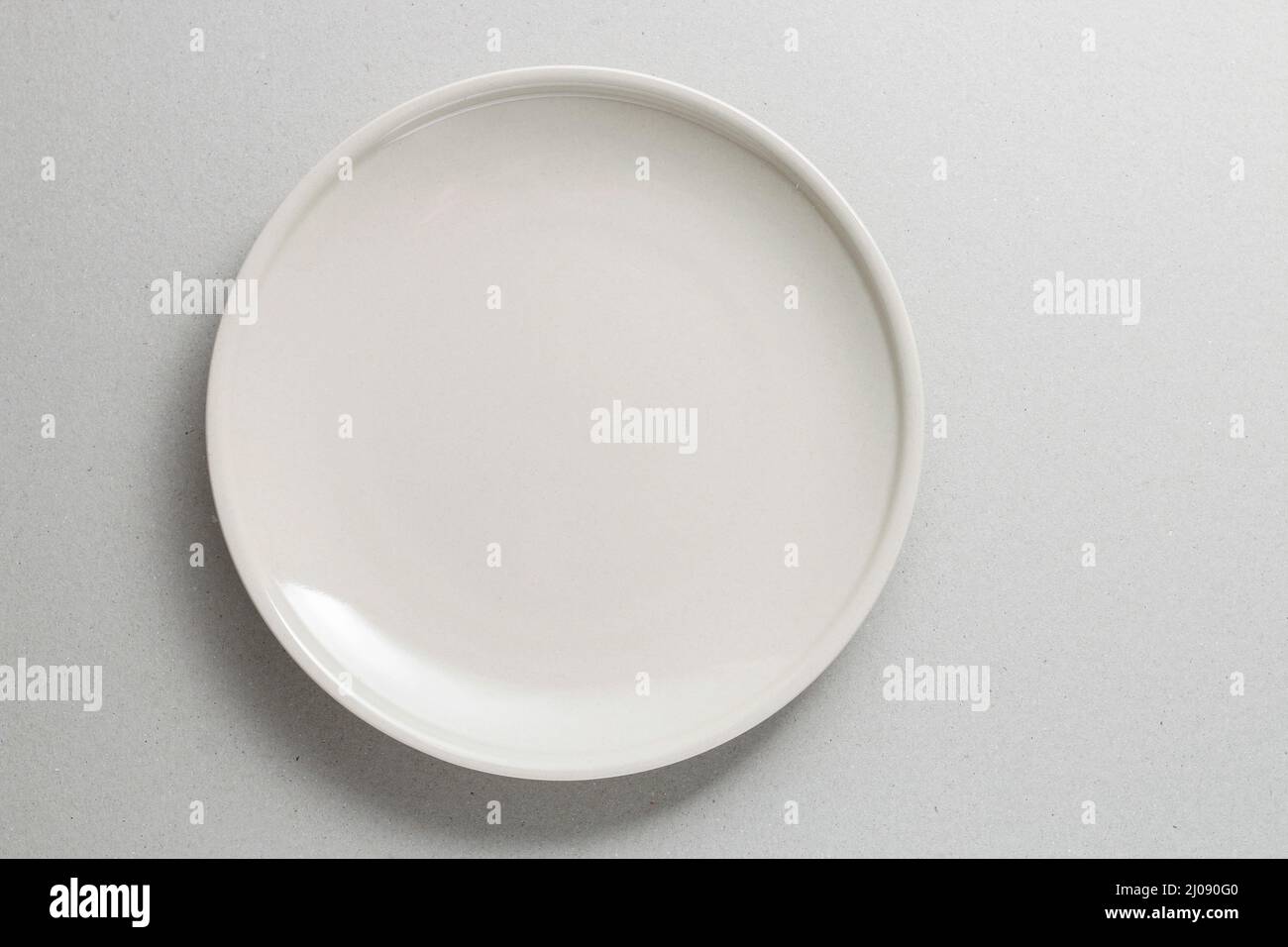 Top view empty plate. Idea of hunger Stock Photo - Alamy