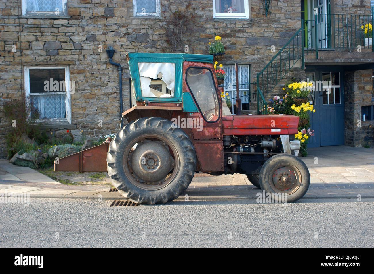 Red tractor in yorkshire Stock Photo - Alamy