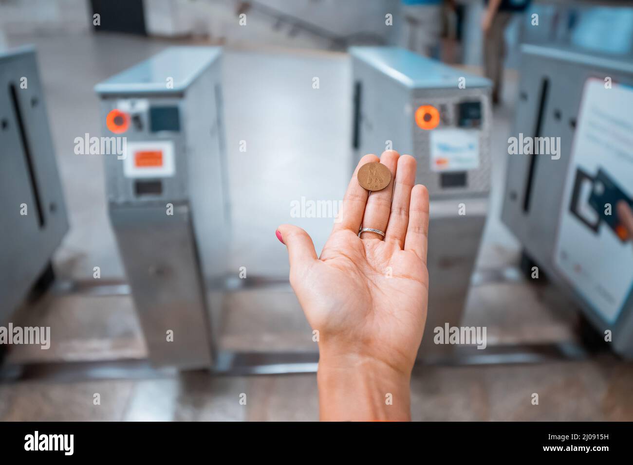 10 July 2021, Novosibirsk, Russia: Metro token at the subway access ...