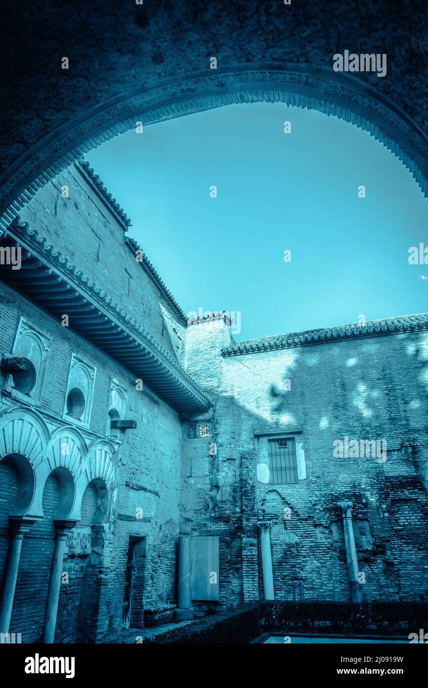 Blue toned shot of design in Beautiful monument The Alcazar from ...