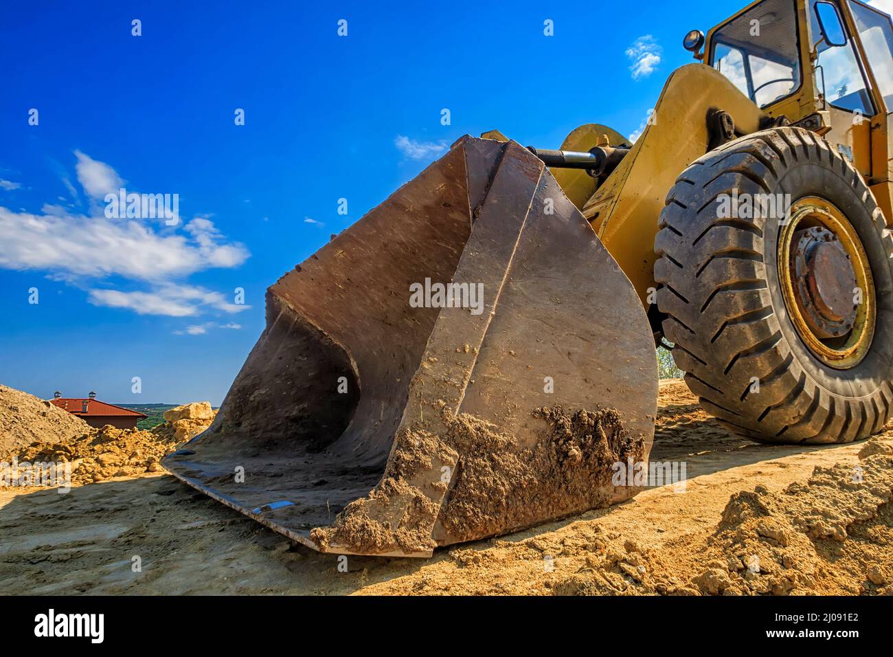 Close up industrial excavator loading hi-res stock photography and ...