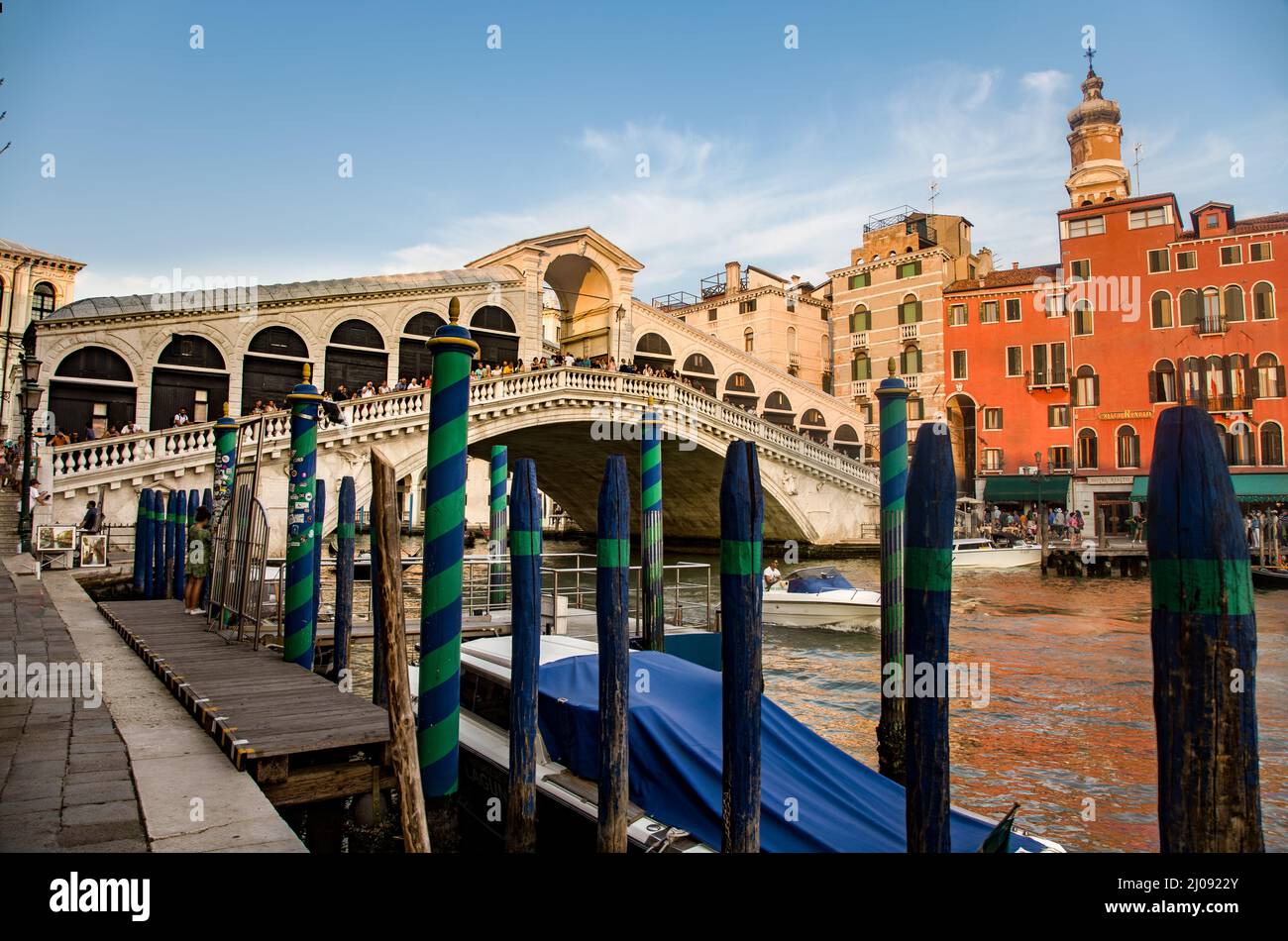 Low angle shot of Rialto bridge with its gondolas over Grand Canal ...