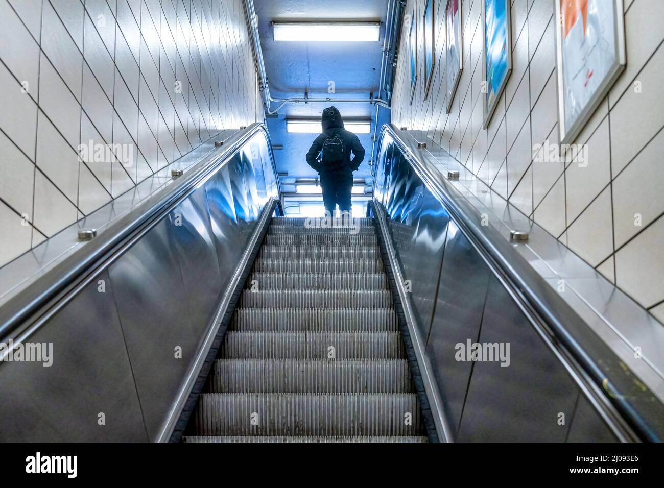 Symmetric view of a TTC subway station escalator in Toronto, Canada ...