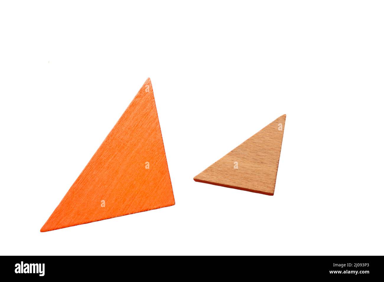 Big and small triangles isolated on white background Stock Photo - Alamy