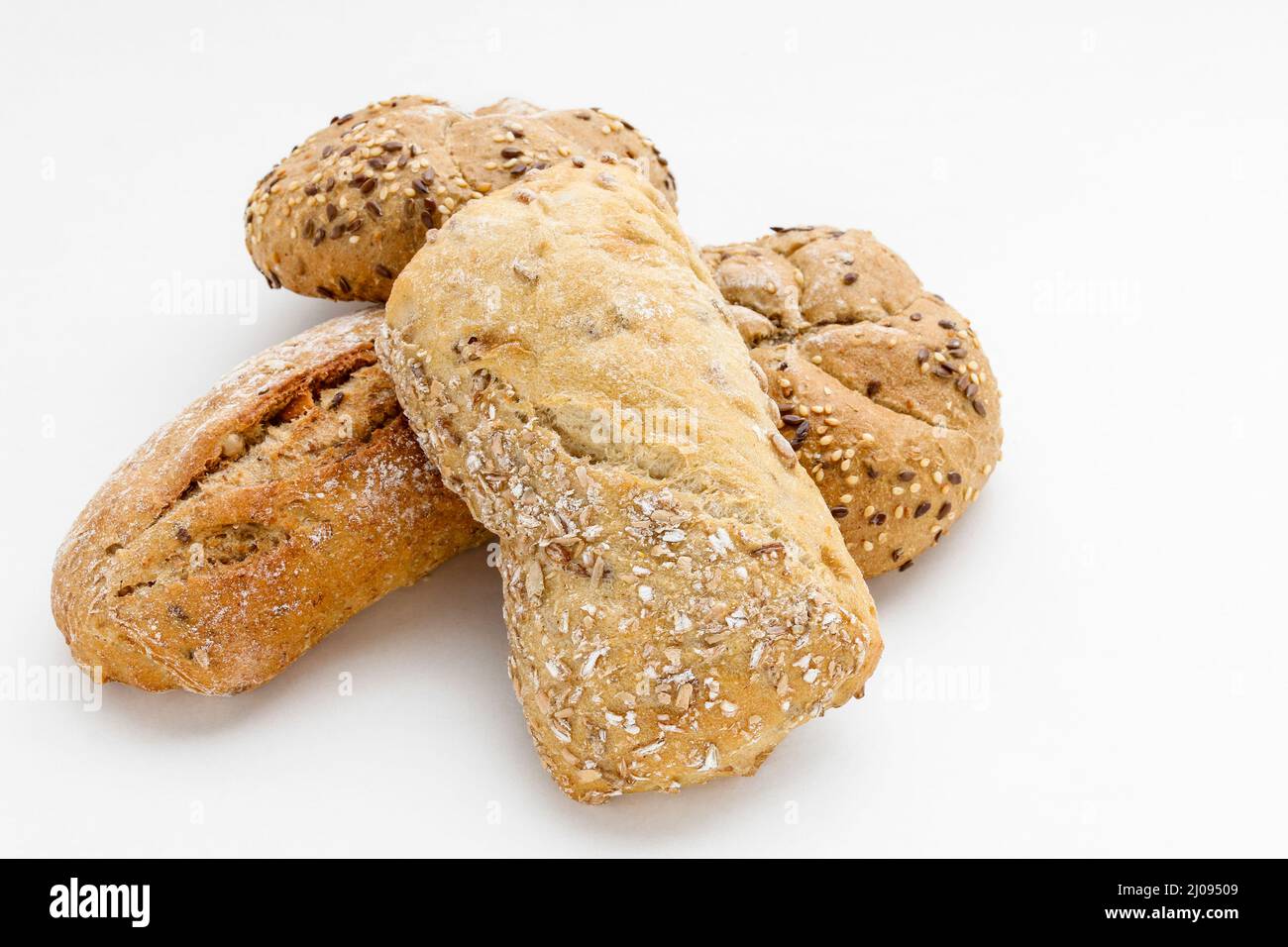 Assorted buns isolated on white. Breakfast time Stock Photo - Alamy