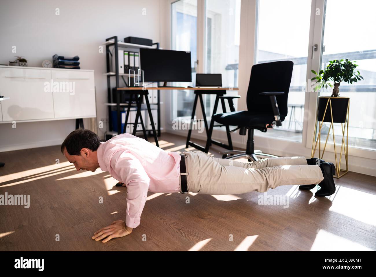 Workout Office Exercise. Healthy Doing Pushups In Office Stock Photo ...