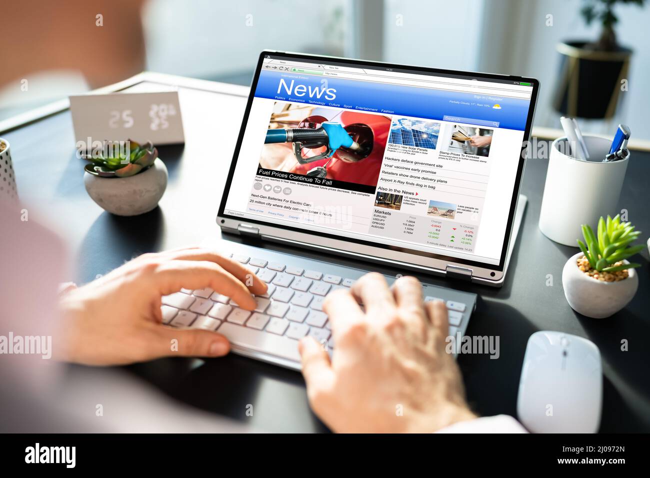 Reading Online News Media. Looking At Newspaper On Screen Stock Photo ...