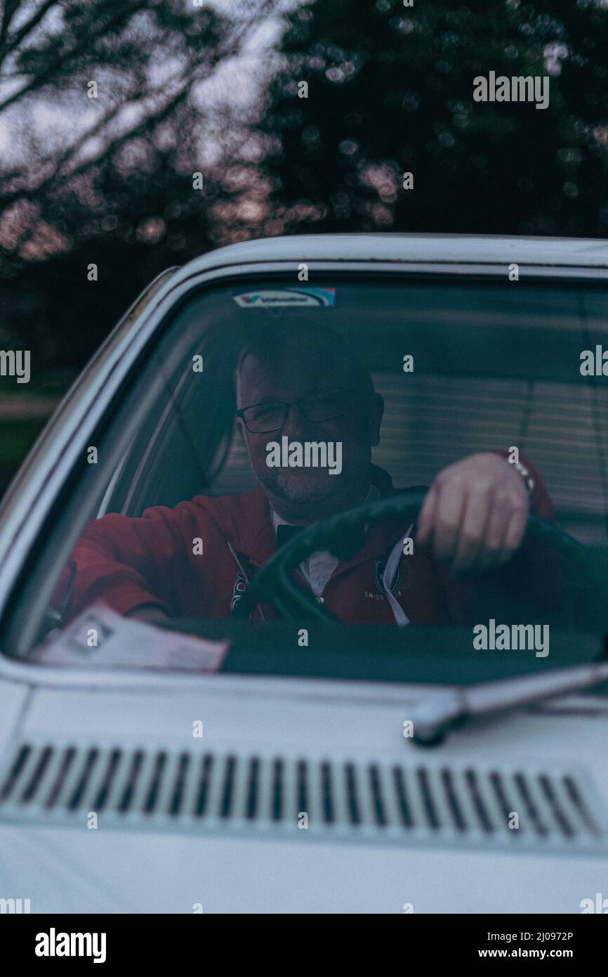 Portrait of an old Holden car collector in his car Stock Photo - Alamy
