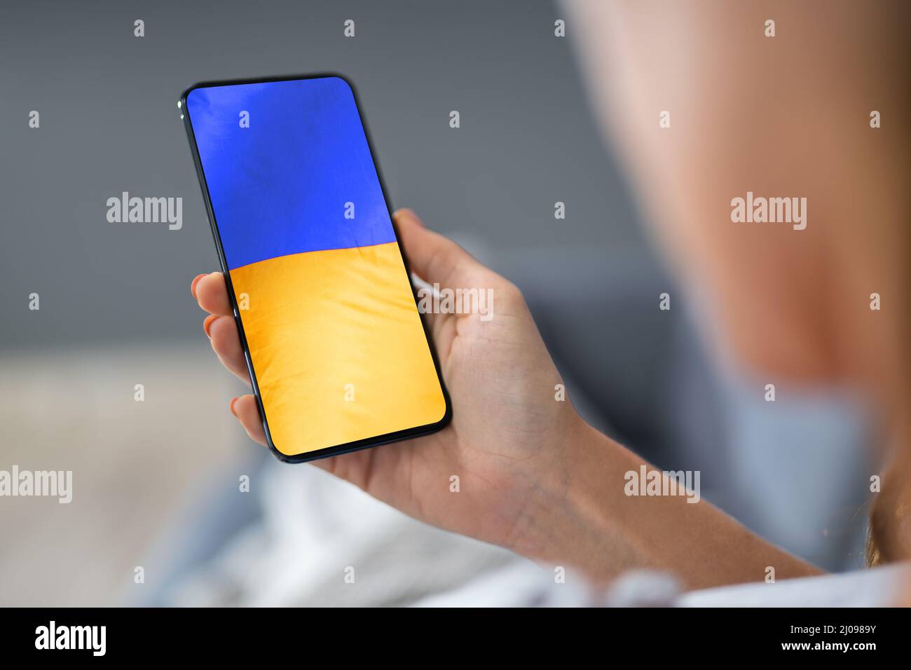 Ukraine Flag On Phone Screen. Technology And National Freedom Stock ...