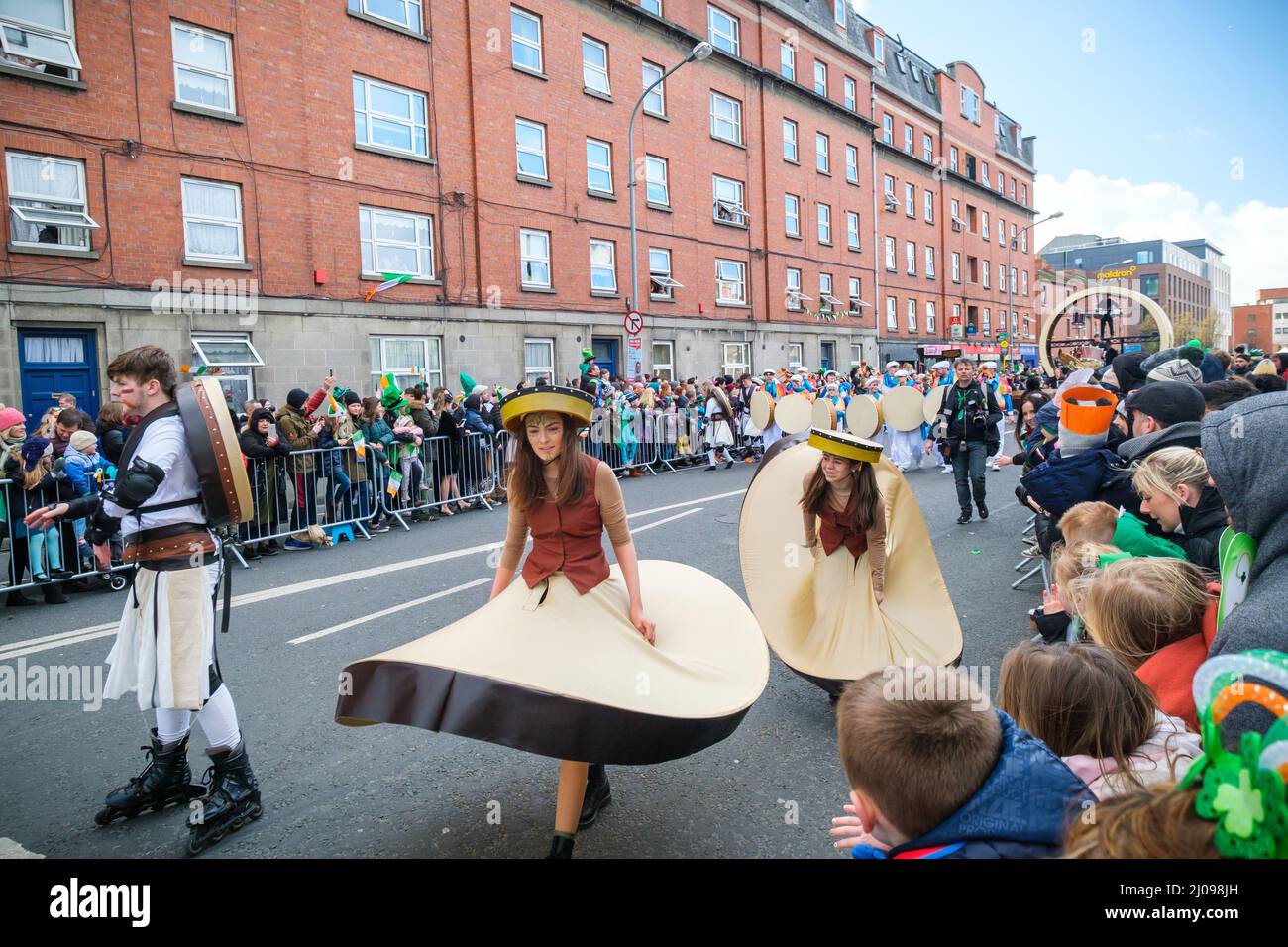 Saint Patrick parade on the streets of Dublin on a sunny day full of ...