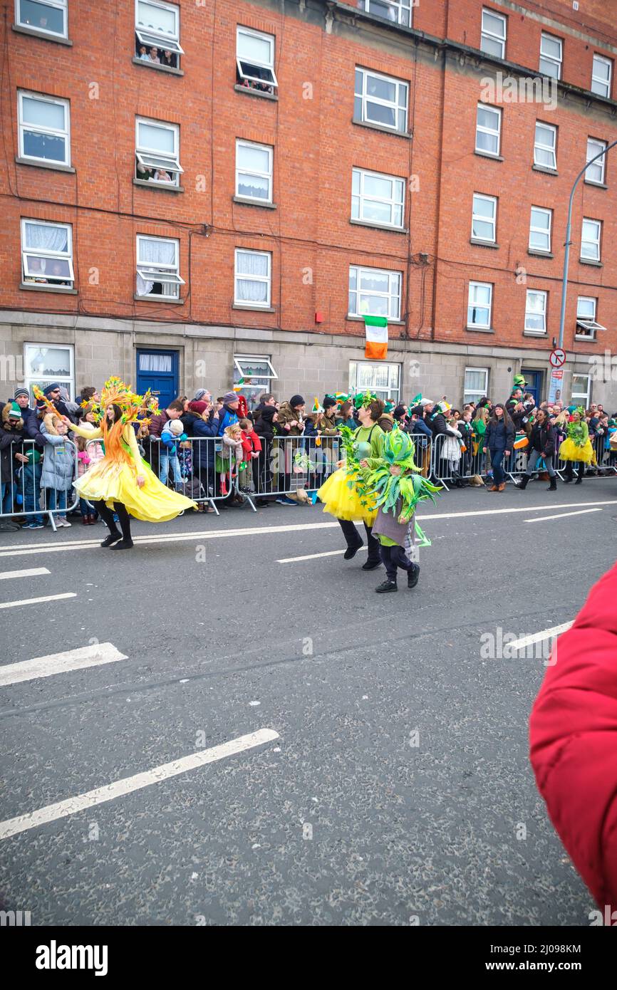 Saint Patrick parade on the streets of Dublin on a sunny day full of ...