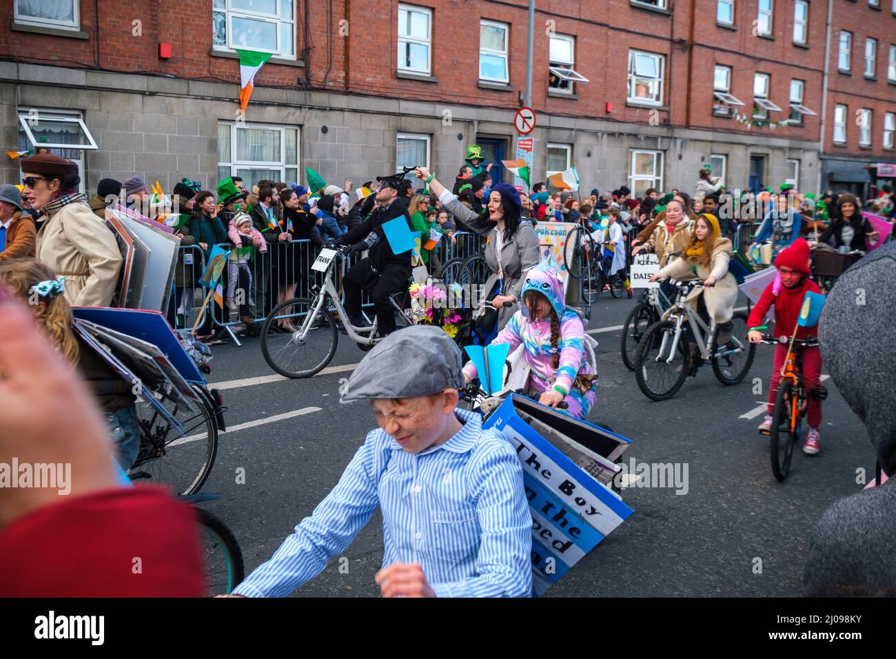 Saint Patrick parade on the streets of Dublin on a sunny day full of ...