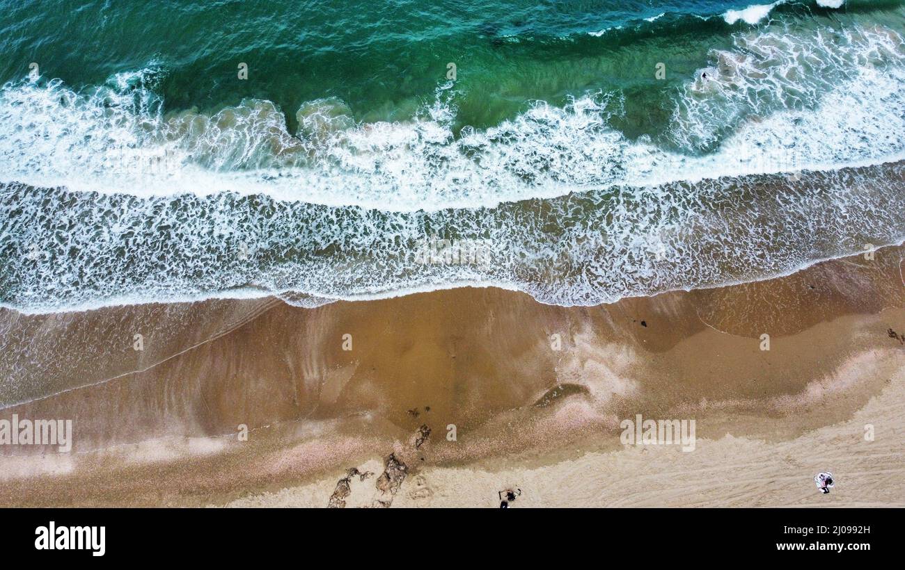 Aerial view of beautiful sea waves on the beach Stock Photo - Alamy