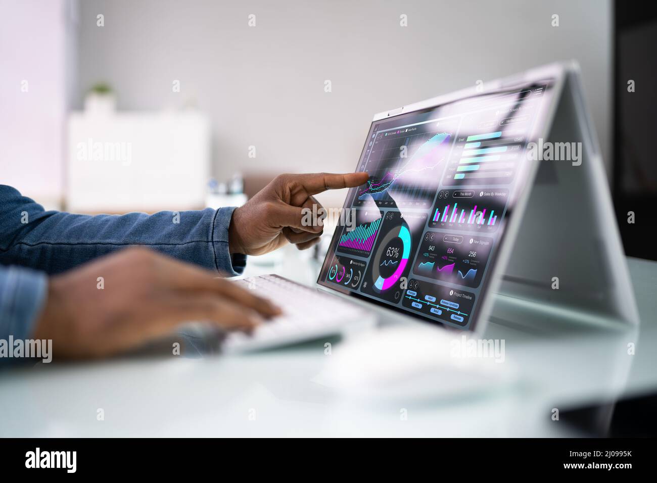 African Businessman Using Analytics Data KPI Dashboard Tech Stock Photo ...