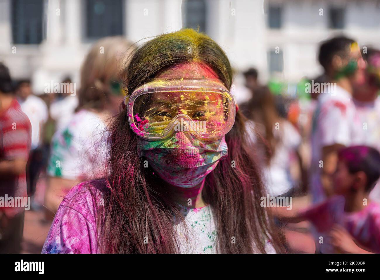 Kathmandu, Nepal. 17th Mar, 2022. A woman's face smeared with vermilion ...