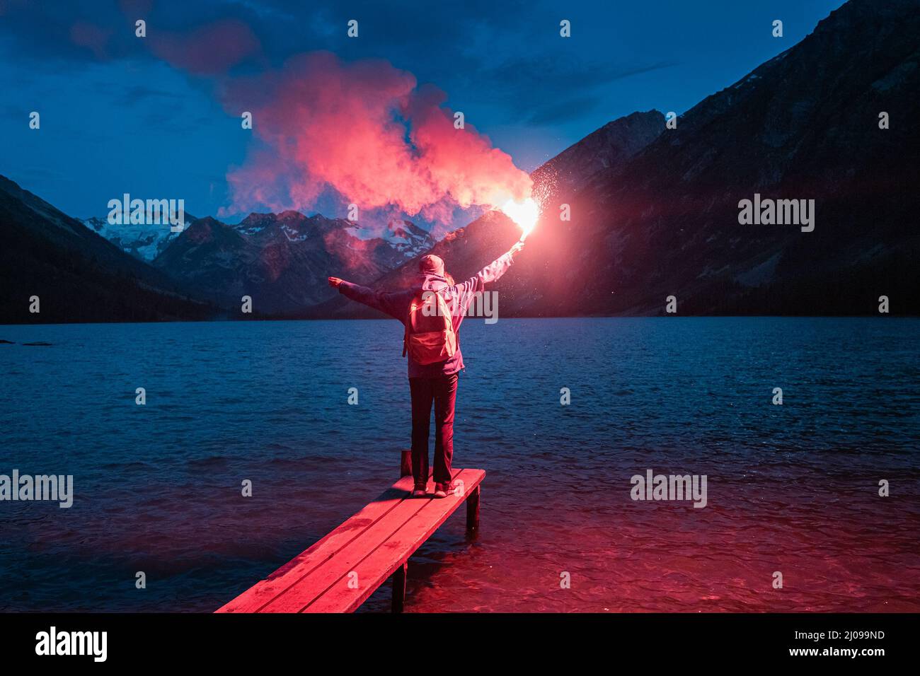 The hiker on the pier lit the emergency red torch and calling for help ...