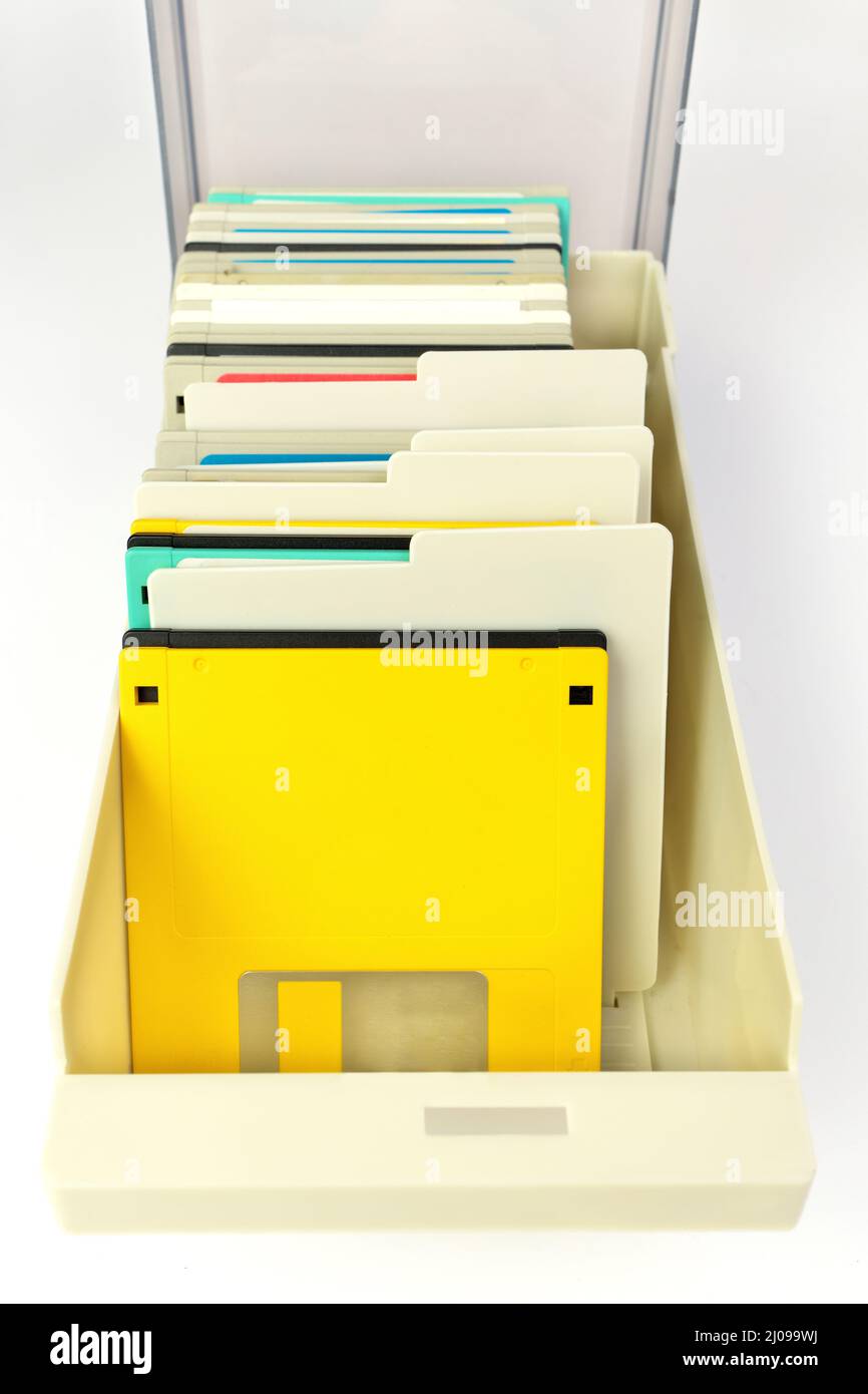 A storage box of 3.5 Inch Floppy disks for background. Retro digital ...
