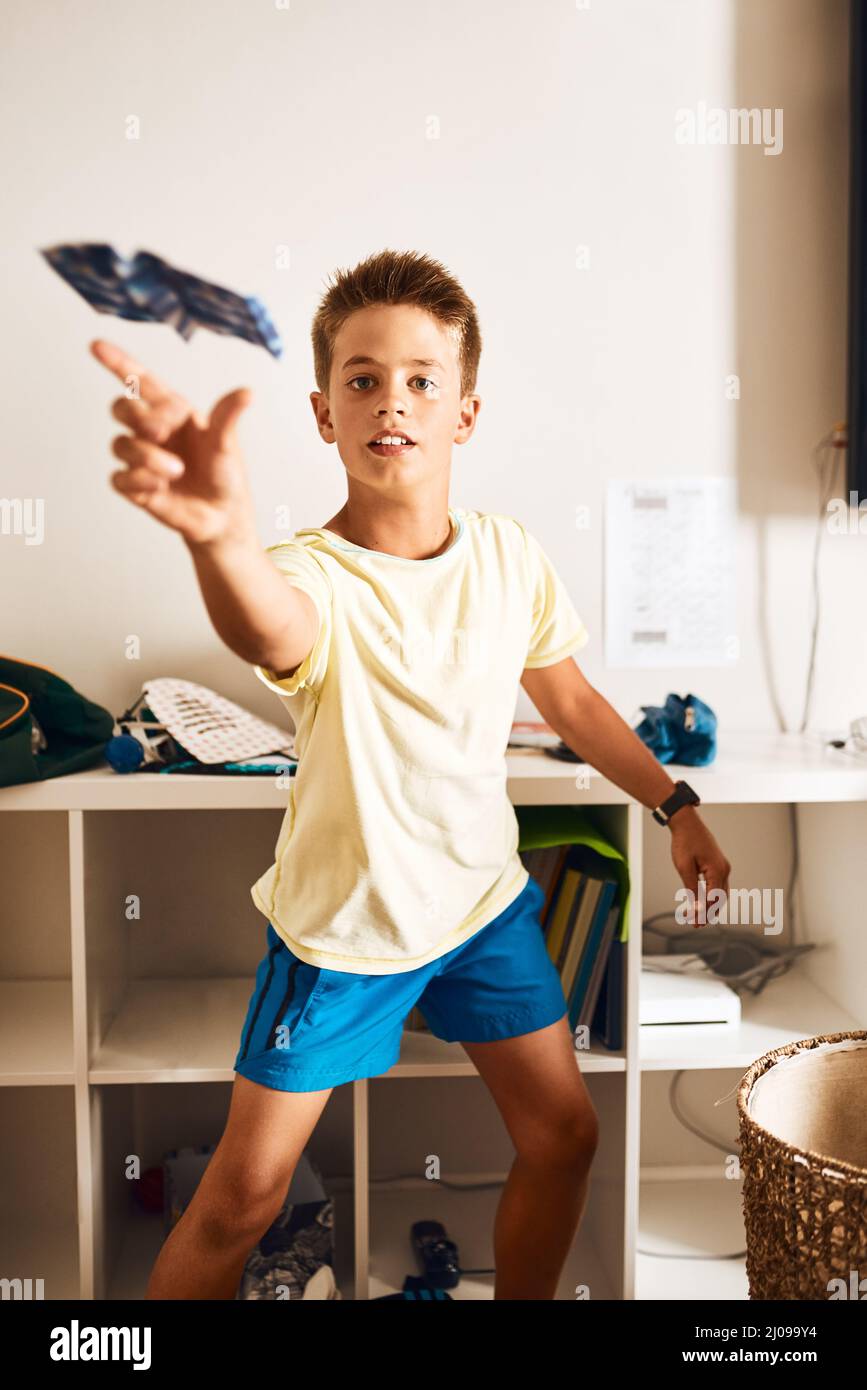 Child throwing paper plane hi-res stock photography and images - Alamy