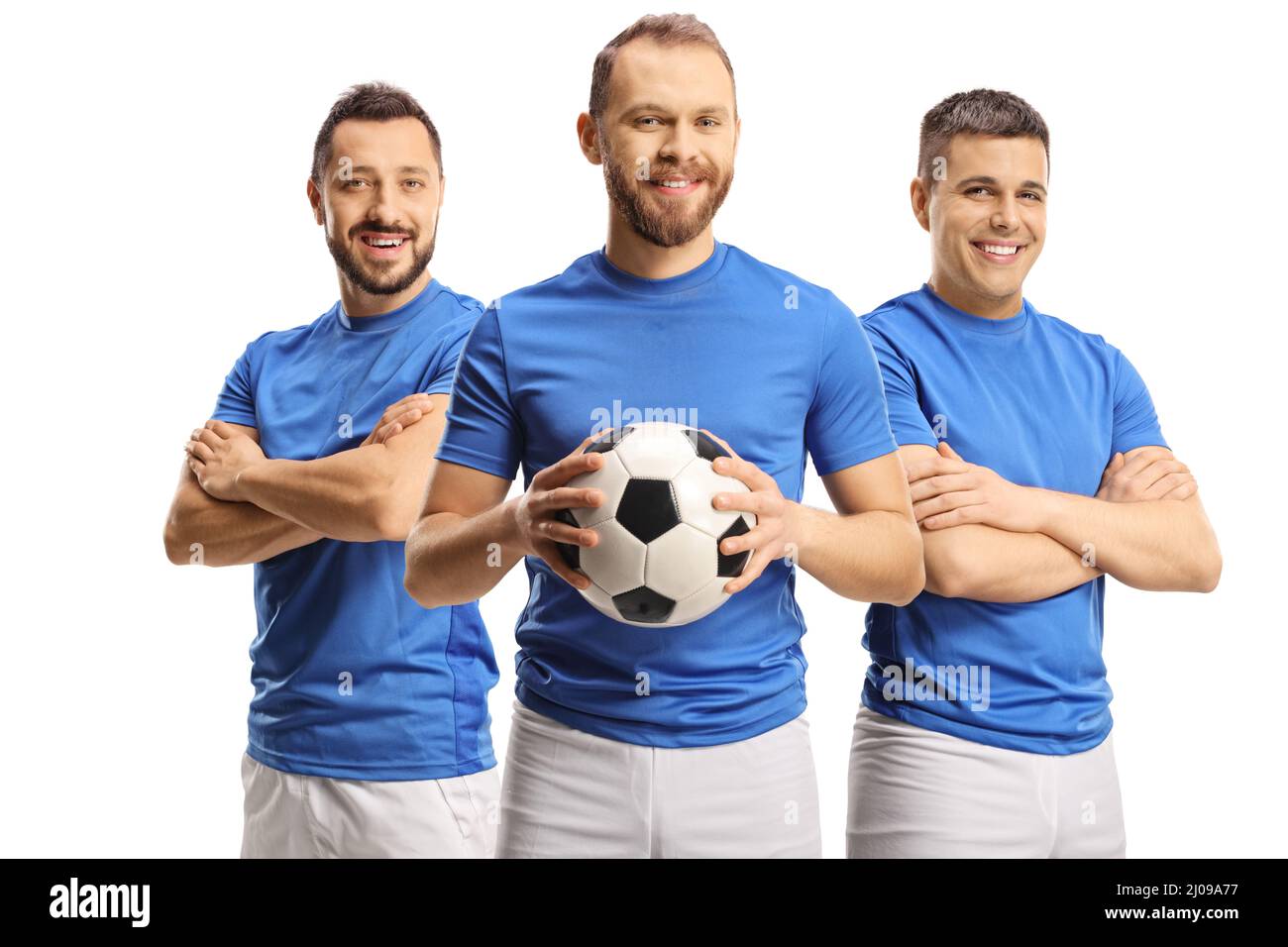 Team of football players smiling at camera isolated on white background ...