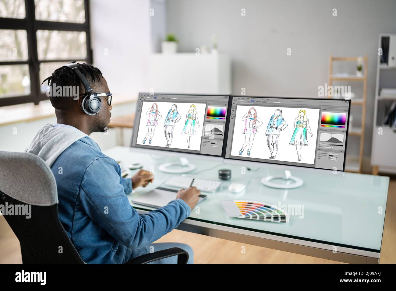 African Graphic Web Designer Using Design Editing Software Stock Photo ...