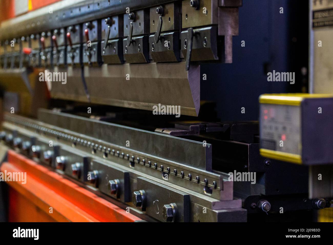 closeup view of industrial sheet bending press brake with tool Stock ...