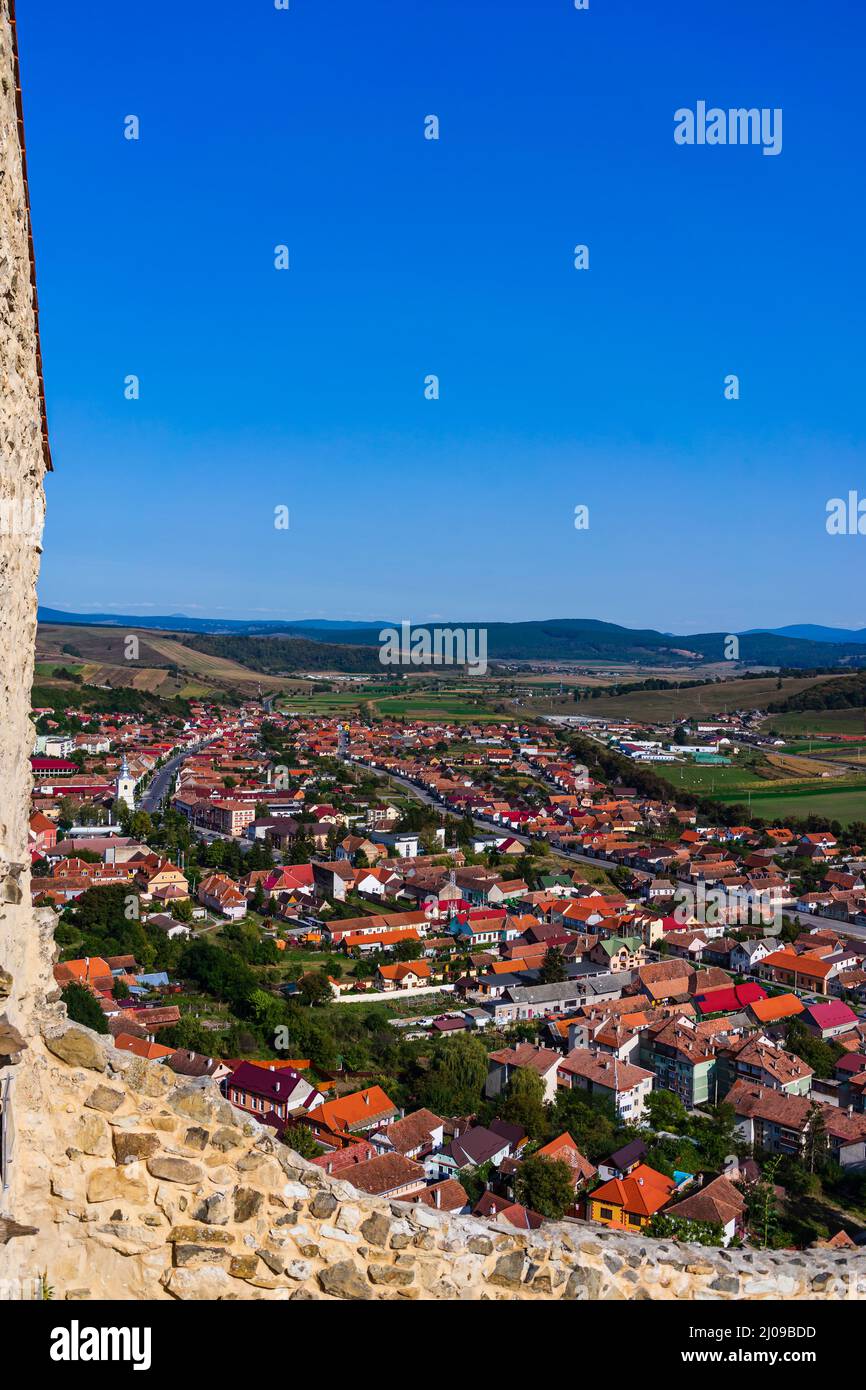 Aerial view of the town center with hills, buildings, streets ...