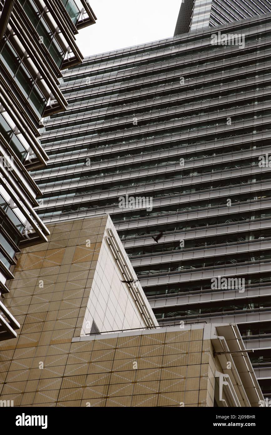Low angle of a high modern building with balconies Stock Photo - Alamy