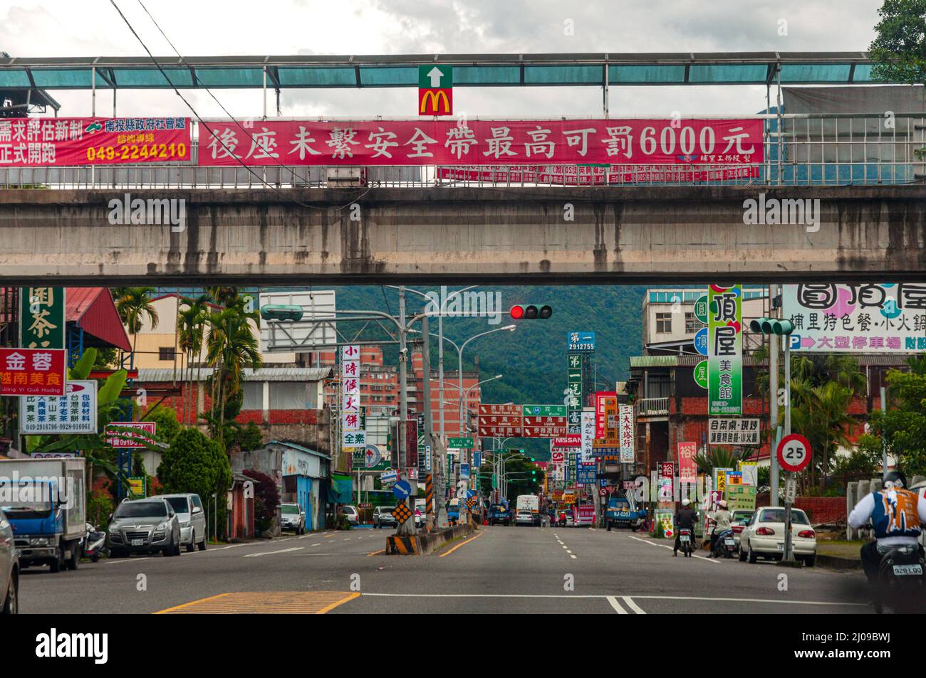 Cityscape view of Taiwan surrounded by cars and billboards Stock Photo ...