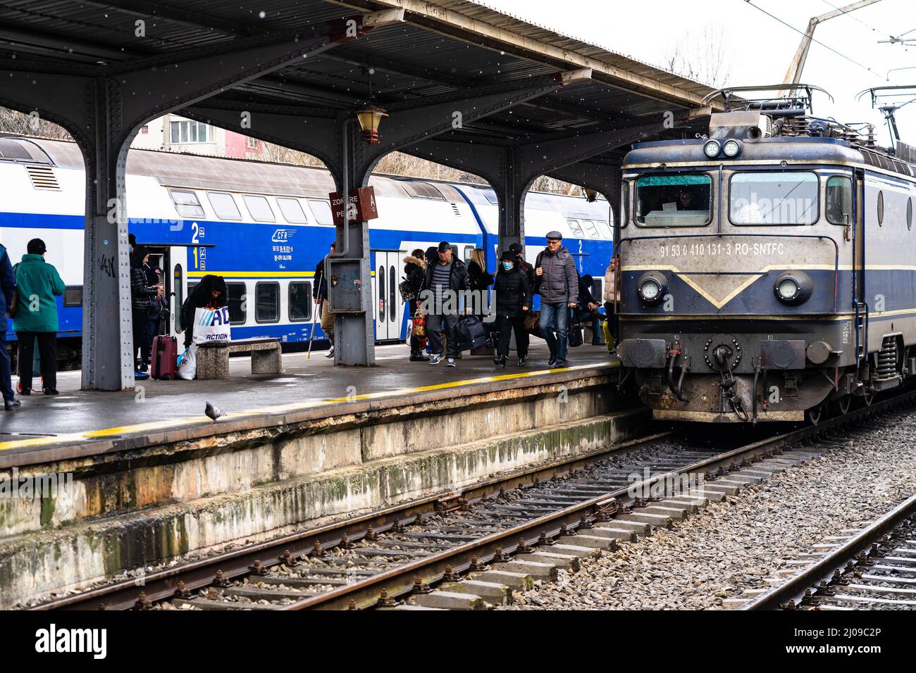 Train waiting for commuters at train platform at Bucharest North ...