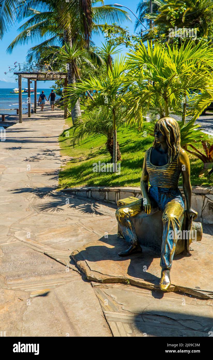 A vertical shot of Brigitte Bardot statue in the town of Armacao dos ...