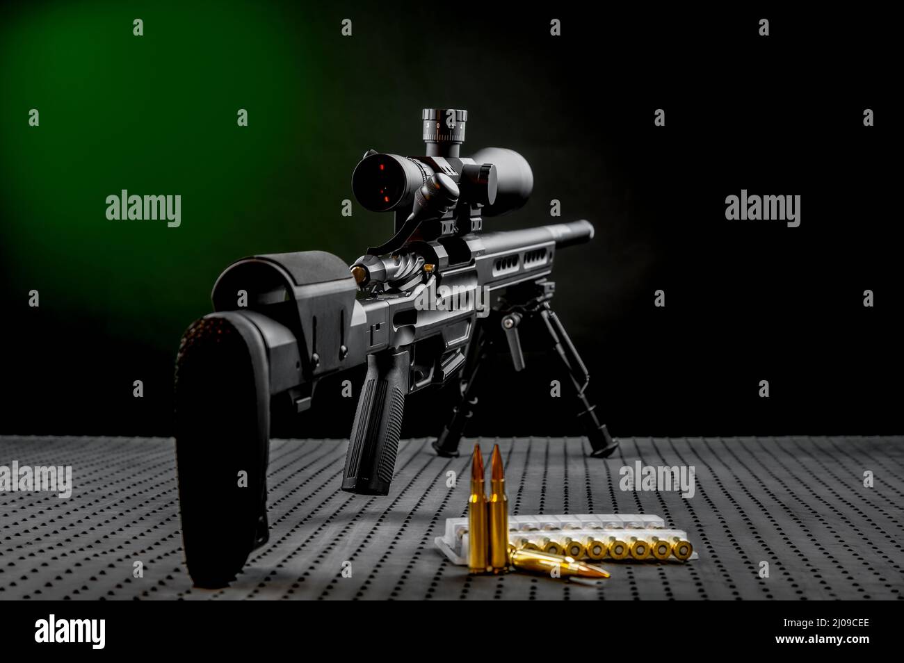 Modern powerful sniper rifle with a telescopic sight mounted on a bipod ...