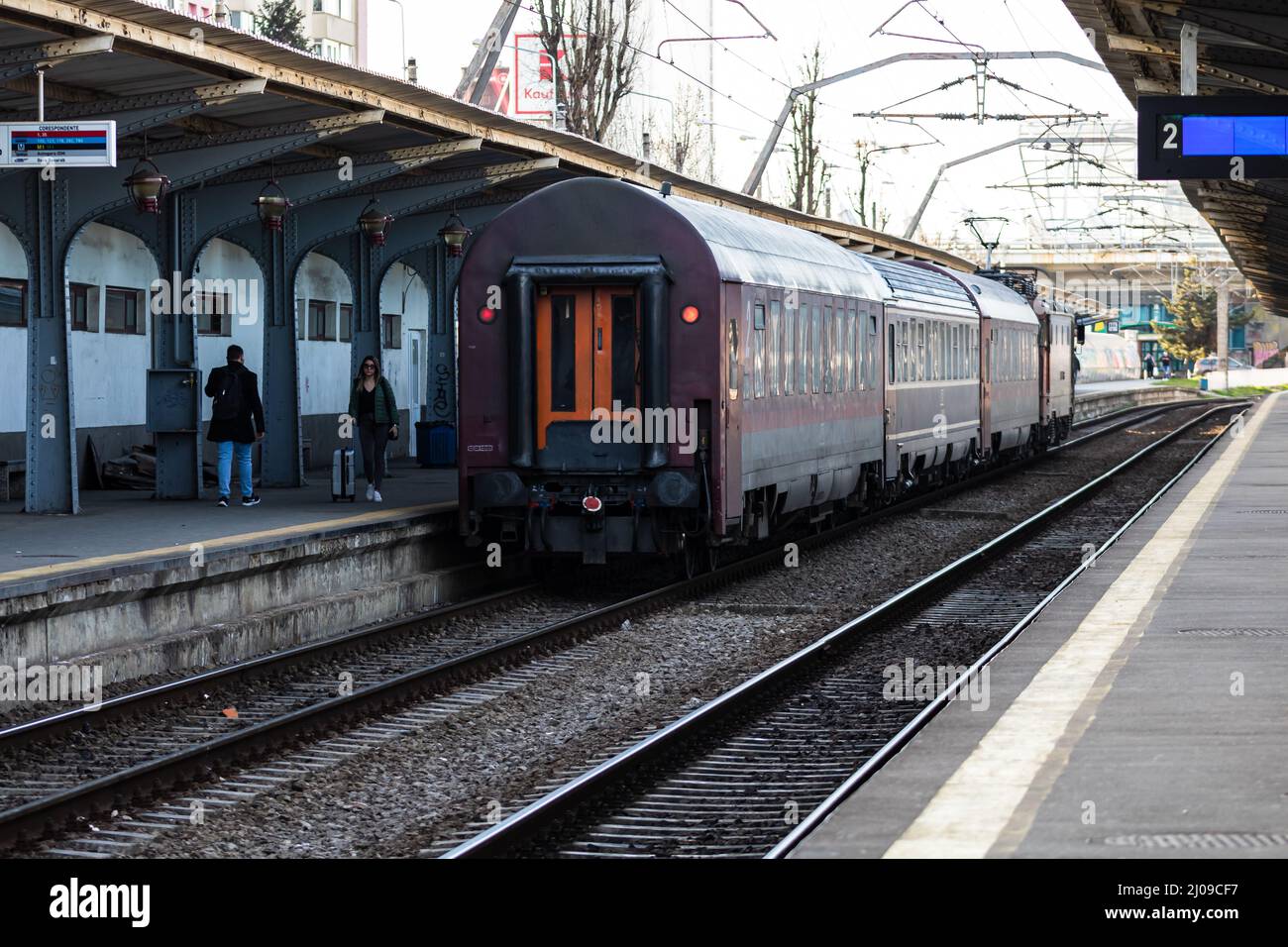 Train in motion or at train platform at Bucharest North Railway Station ...