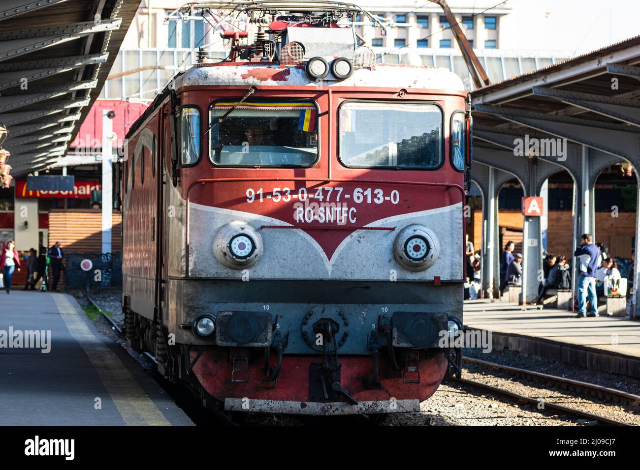 Train in motion or at train platform at Bucharest North Railway Station ...