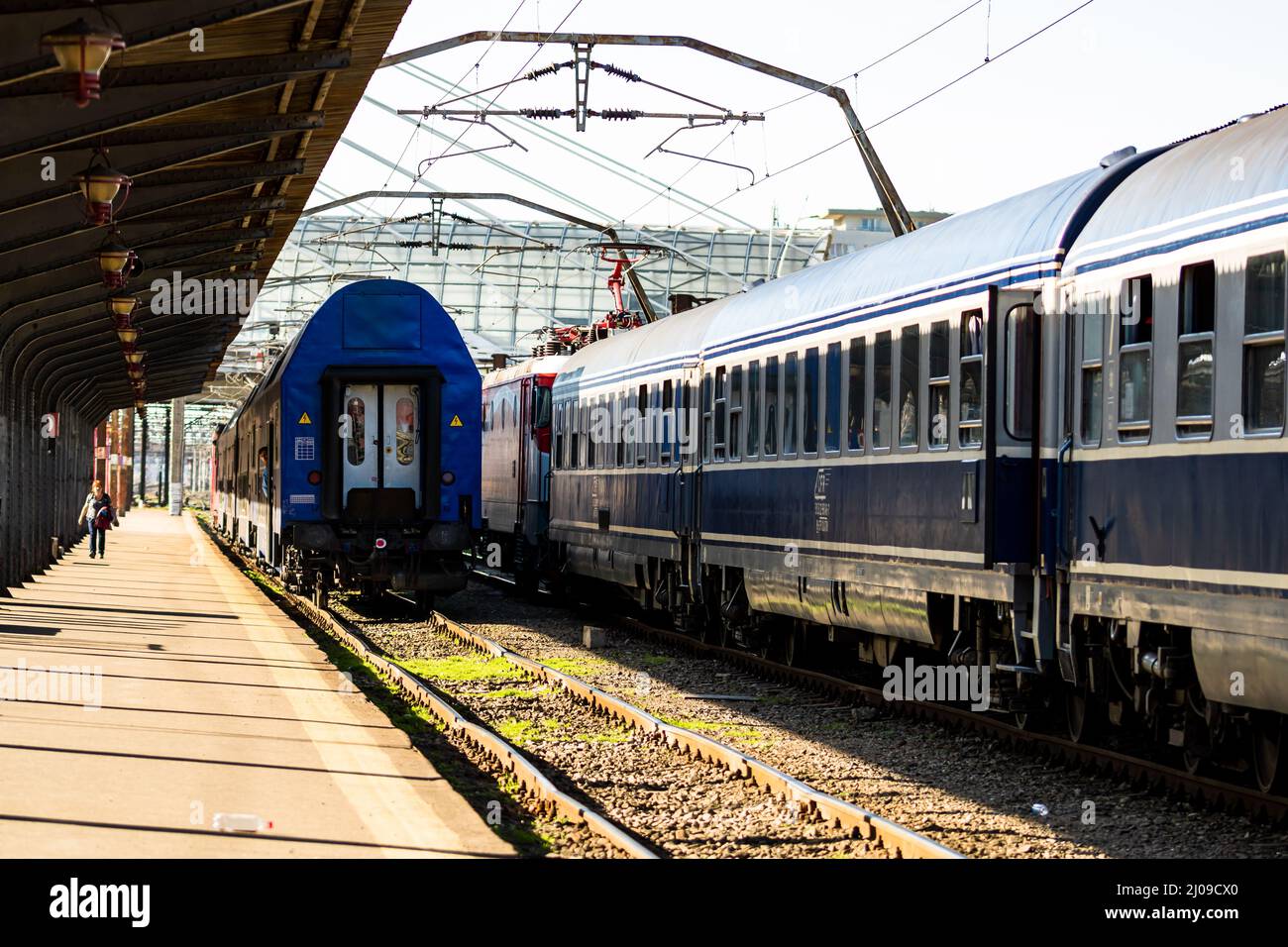Train in motion or at train platform at Bucharest North Railway Station ...