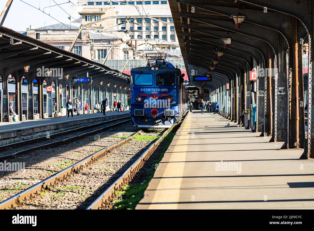 Train in motion or at train platform at Bucharest North Railway Station ...