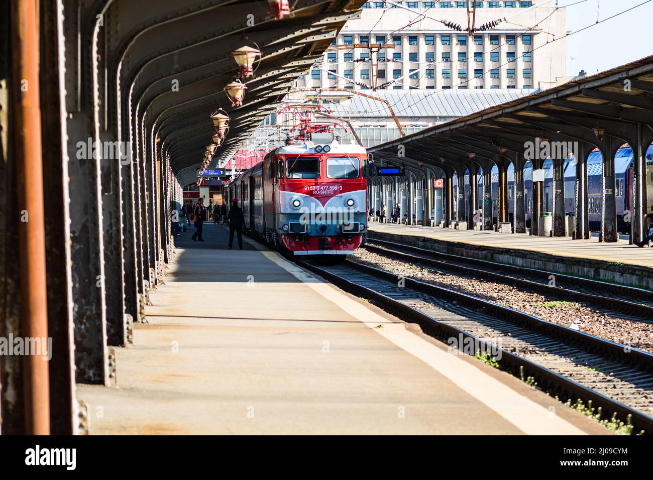 Train in motion or at train platform at Bucharest North Railway Station ...