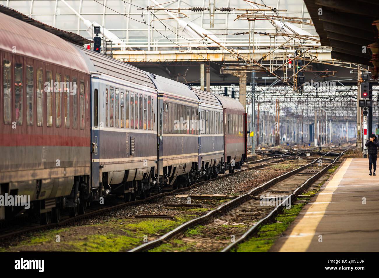 Train in motion or at train platform at Bucharest North Railway Station ...