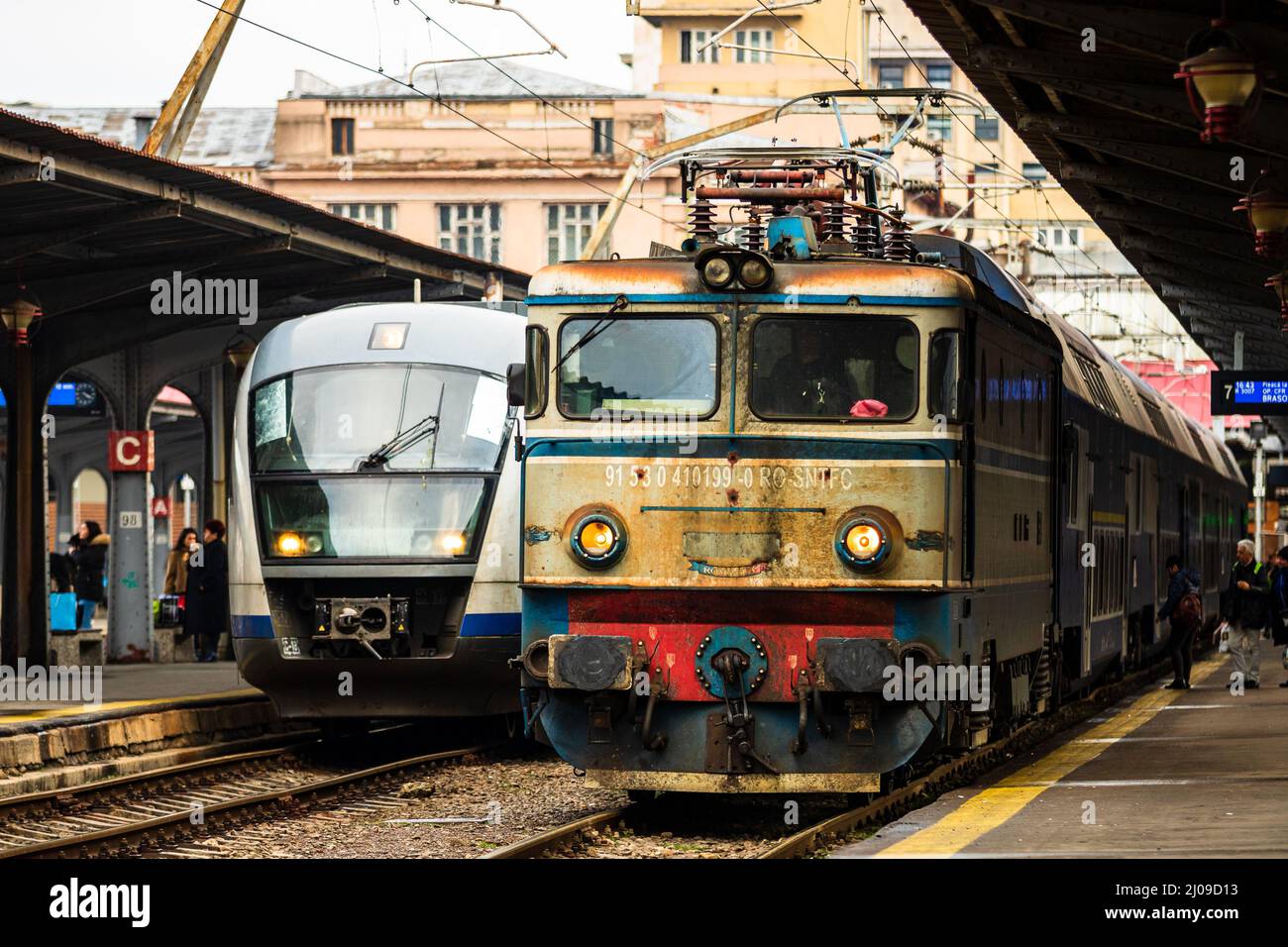 Train in motion or at train platform at Bucharest North Railway Station ...
