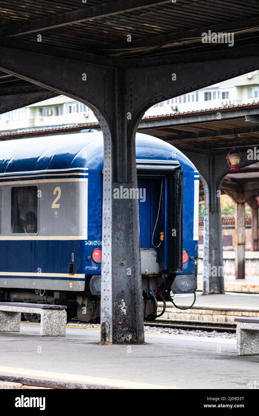 Train in motion or at train platform at Bucharest North Railway Station ...